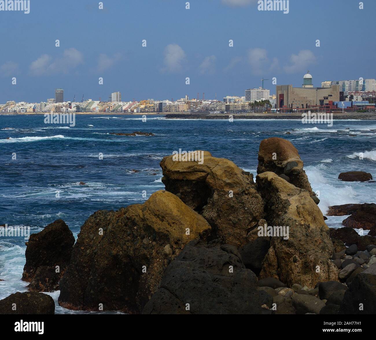 Big rocks and city, El Rincon, north coast of Las Palmas, Gran Canaria ...