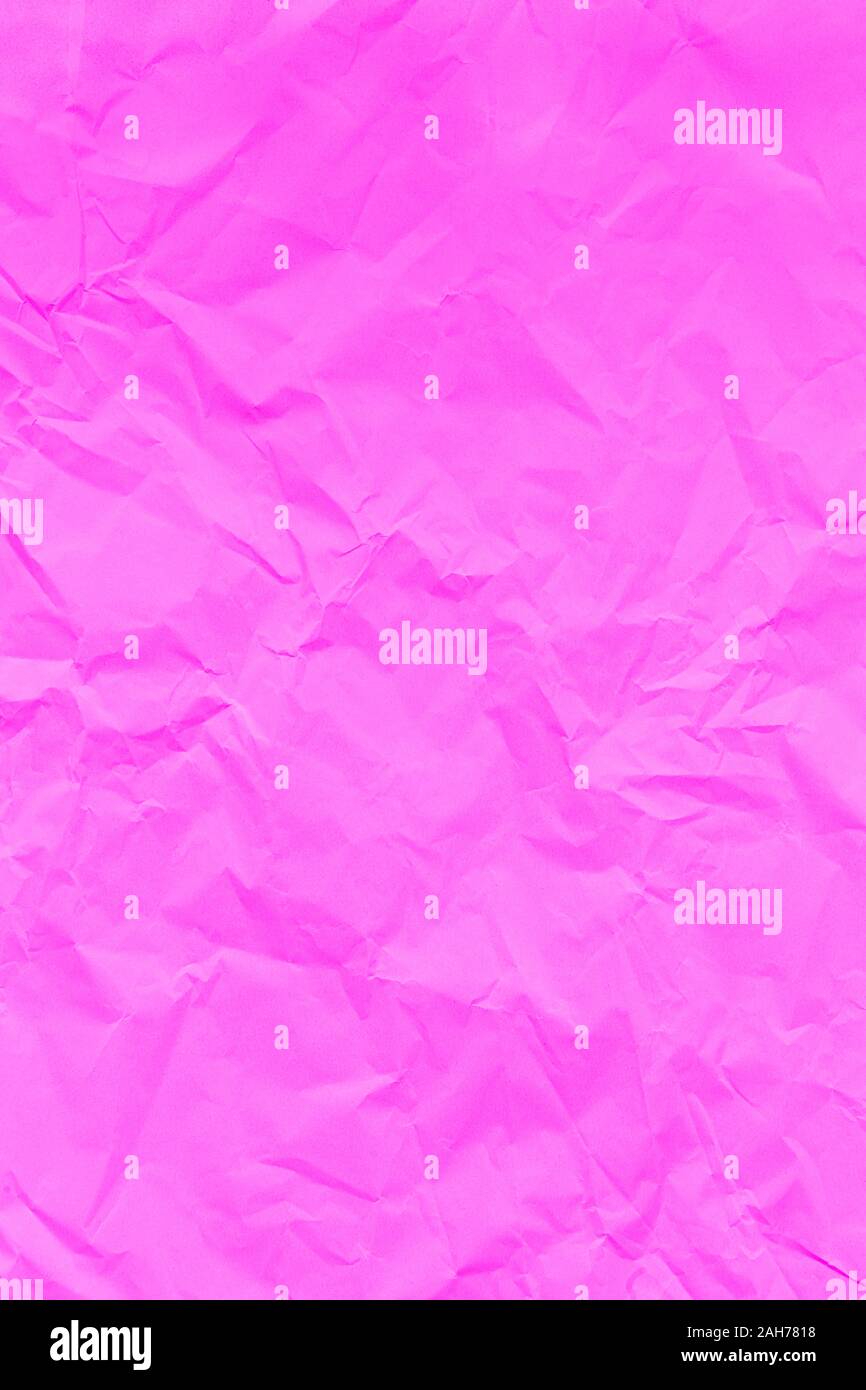 Pink crumpled wrinkled textured paper background. Copy space Stock ...