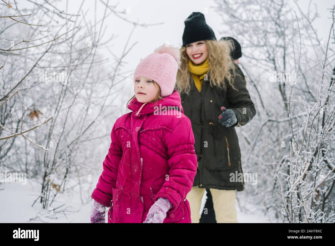 family spends time together in the winter Stock Photo - Alamy