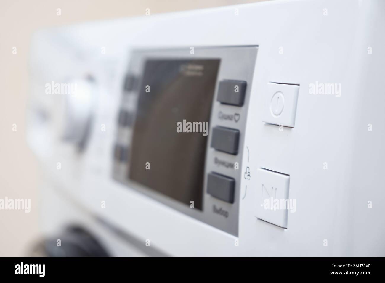 empty screen and buttons on control panel of modern washing machine on ...