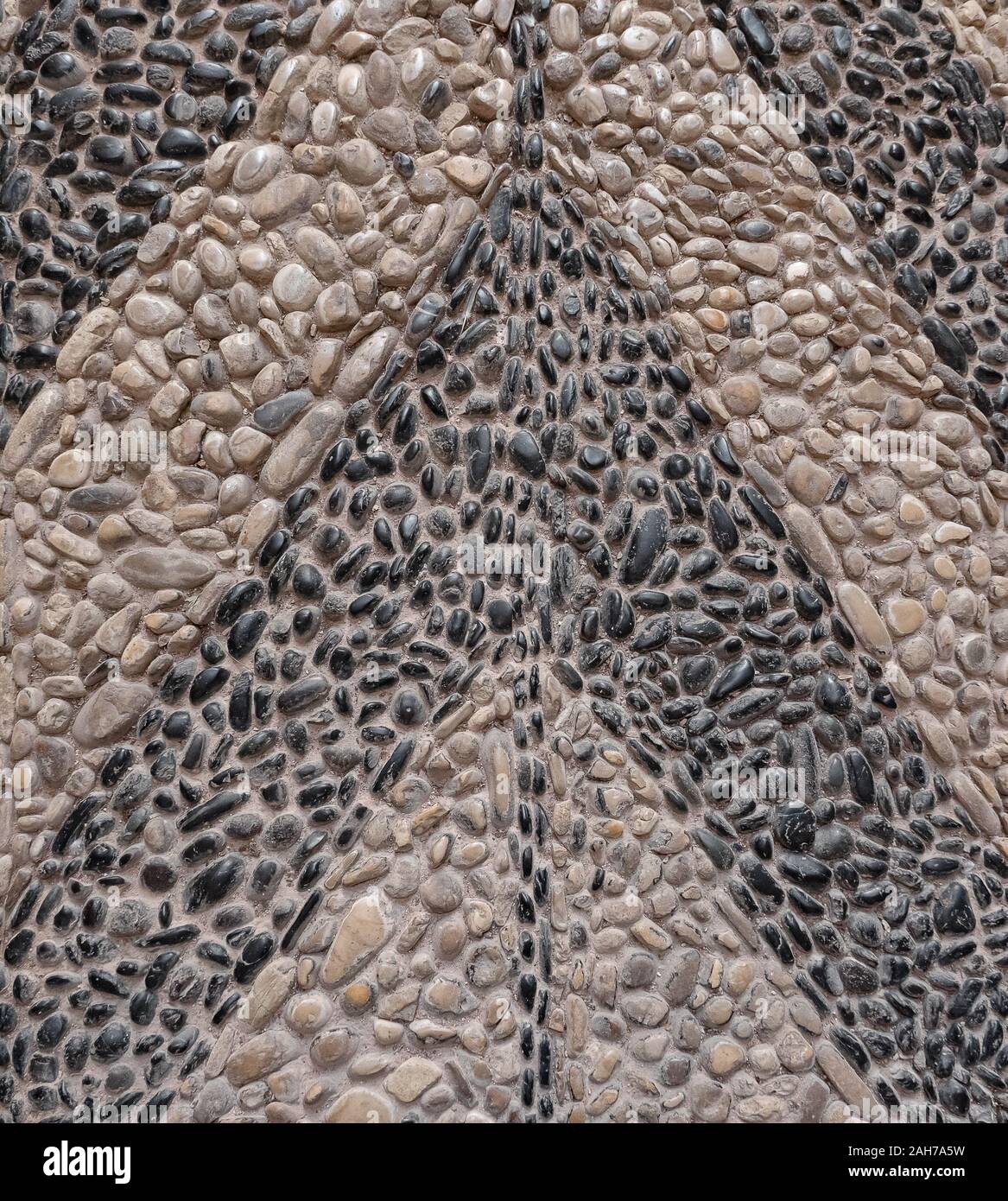 Path with an ancient pattern of pebbles. Texture Stock Photo - Alamy
