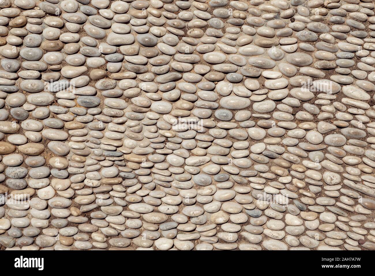 Ancient path of light pebbles. Texture, close up Stock Photo - Alamy