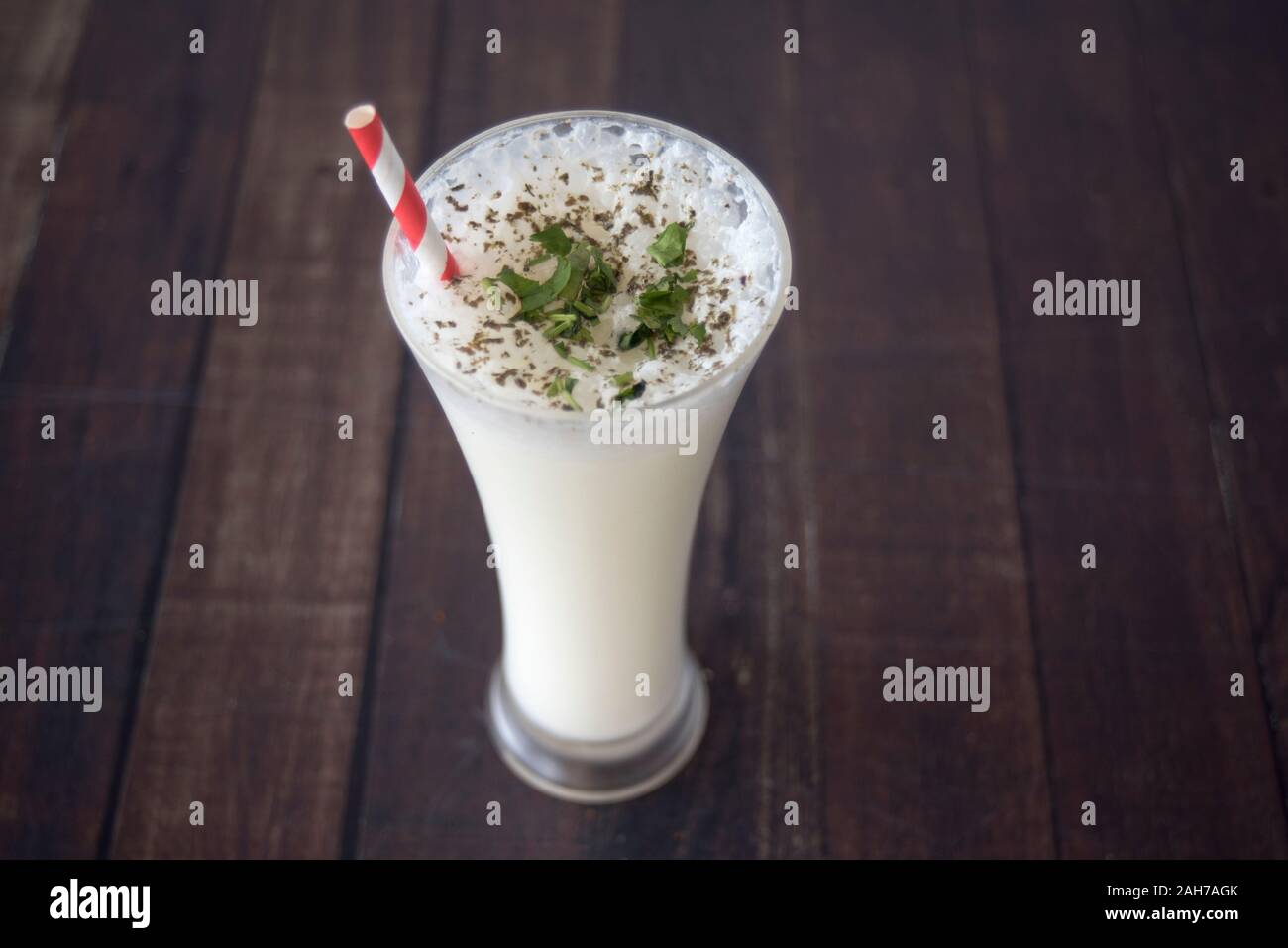 A tall glass of Lassi, an Indian refreshing drink made with yogurt and ...