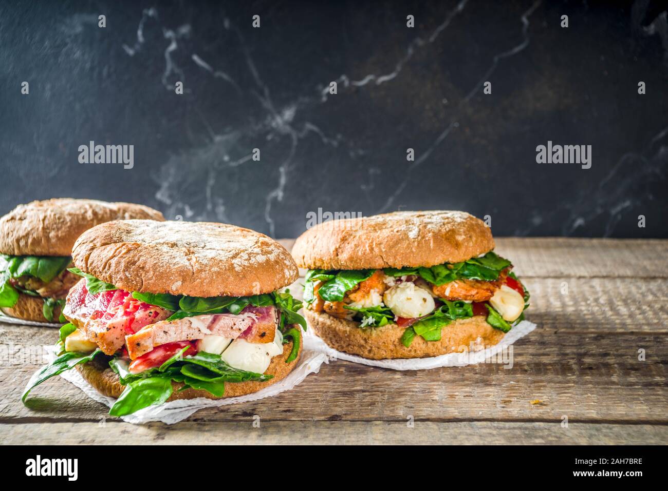 Various seafood and fish burgers assortment. Homemade healthy burger ...