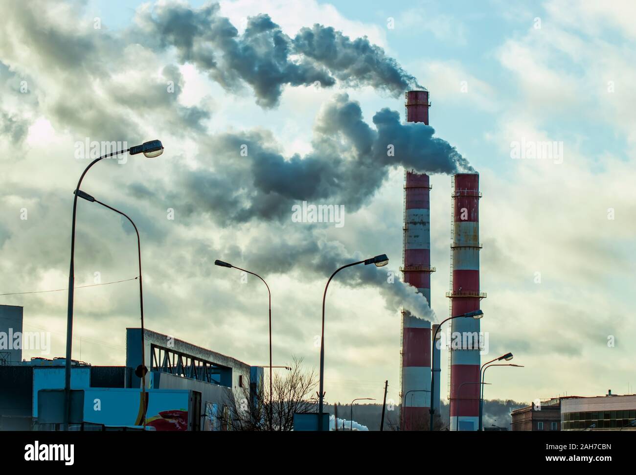 Factory polluting the city hi-res stock photography and images - Alamy