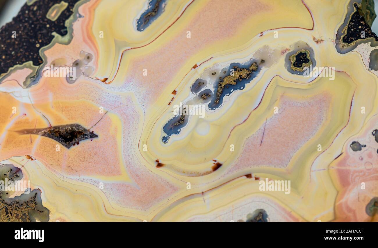The texture of the slice of rock with mineral inserts Stock Photo - Alamy