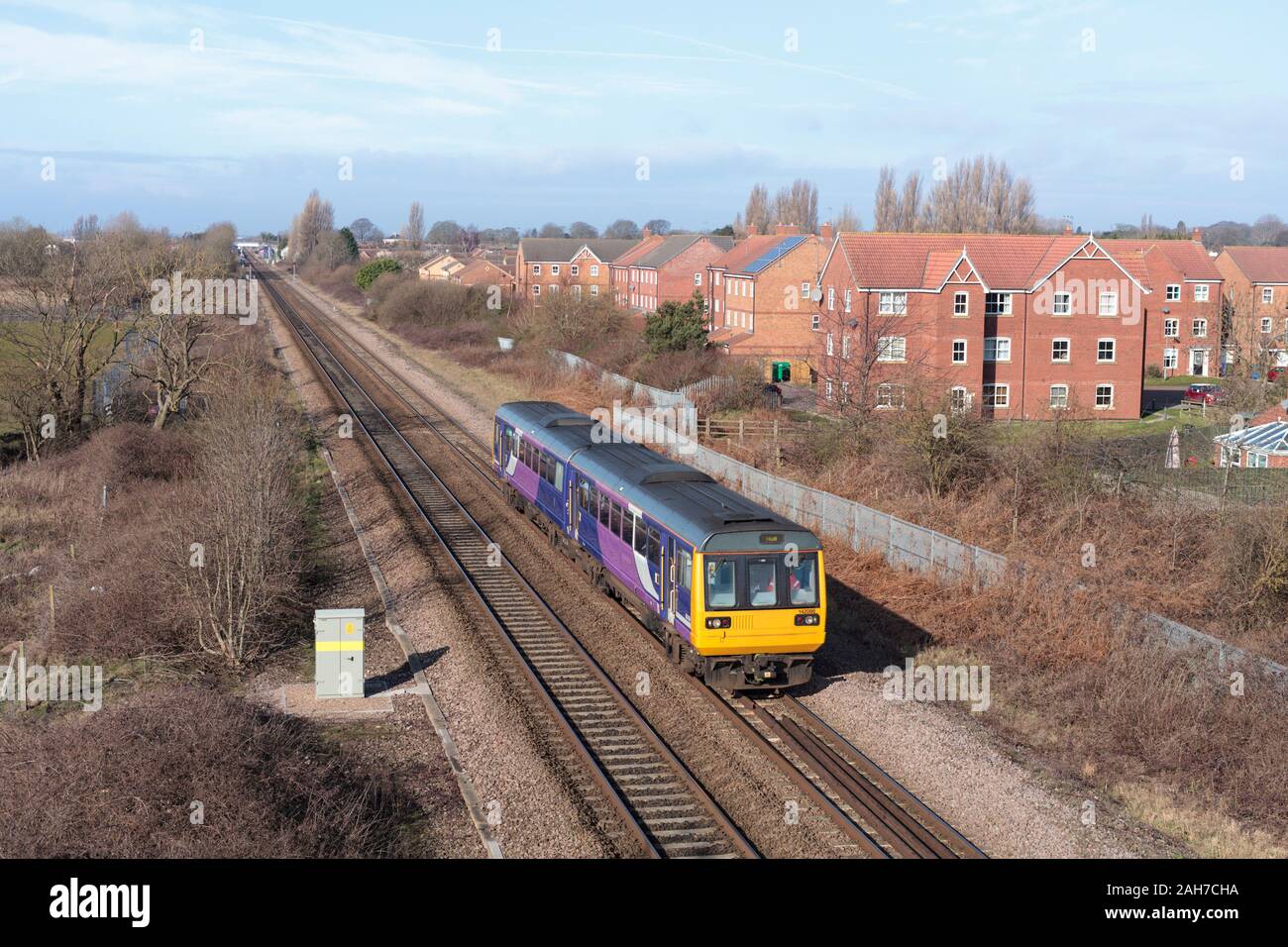 Arriva Northern rail class 142 pacer train 142086 passing Brough, (west ...