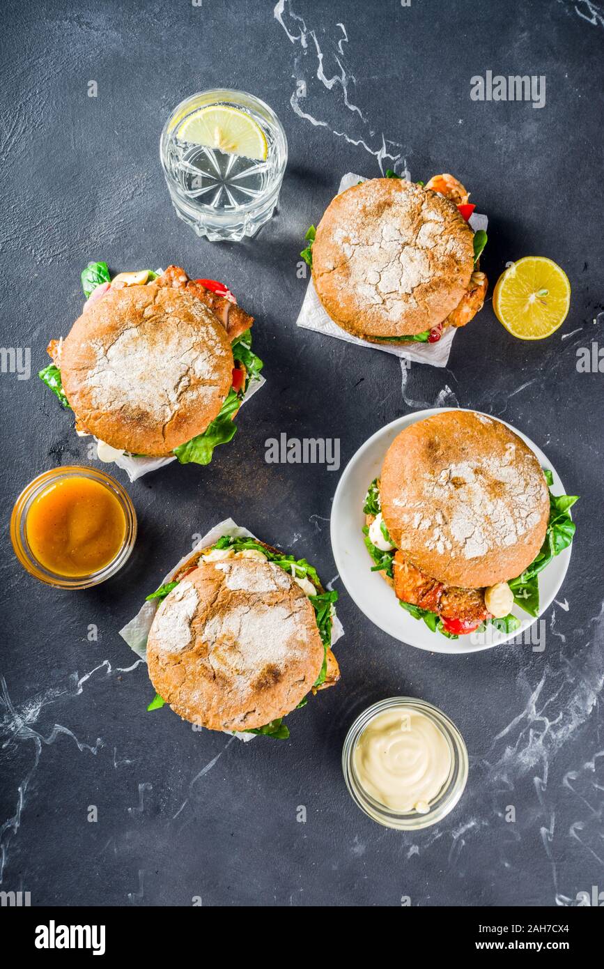 Various seafood and fish burgers assortment. Homemade healthy burger ...