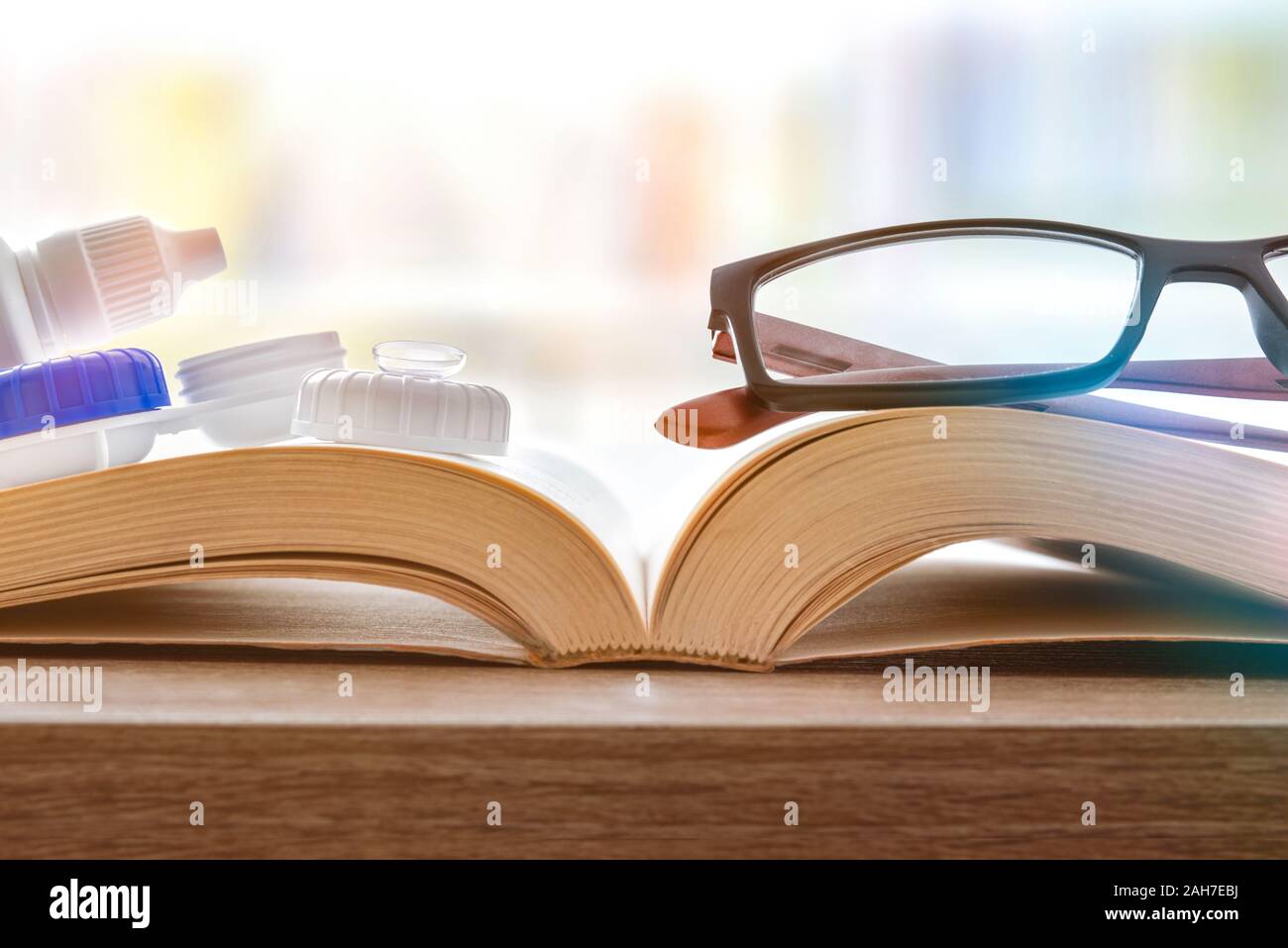 Vision correction for reading books with bookshelf in the background ...