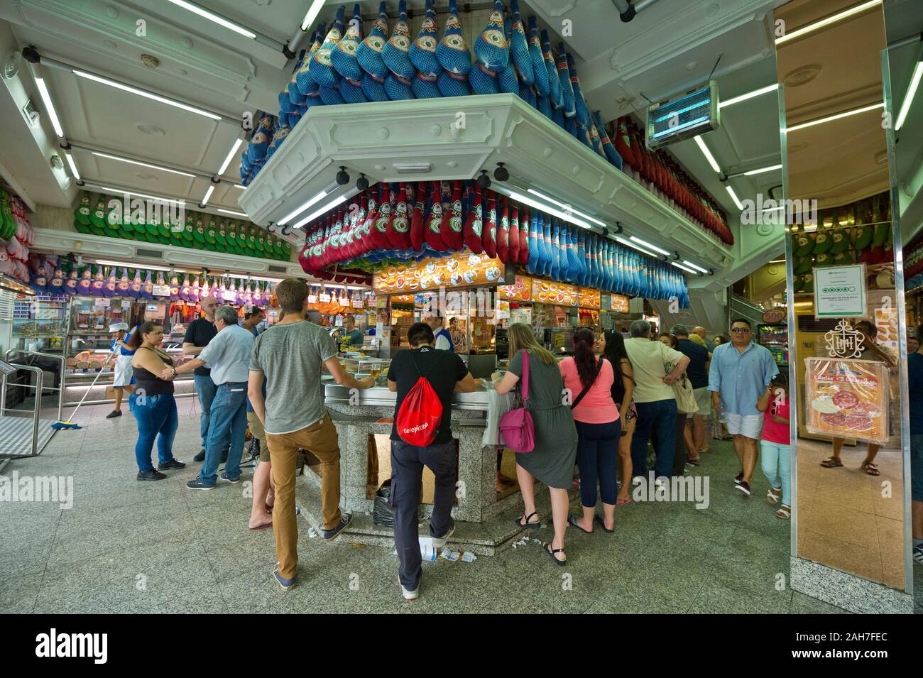 People having food and drink at a bar in Madrid, Spain Stock Photo - Alamy