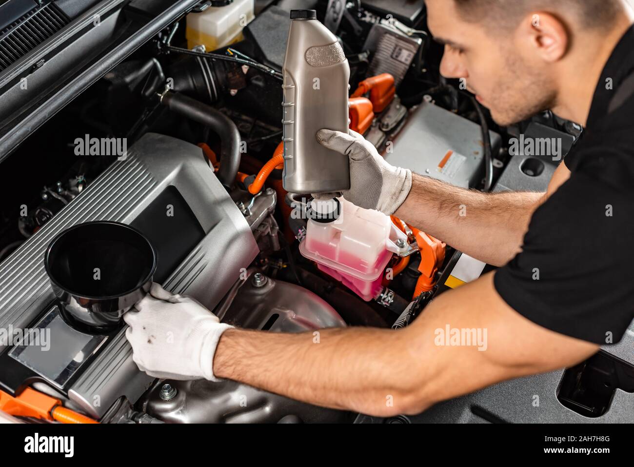 Man holding bottle motor hi-res stock photography and images - Alamy