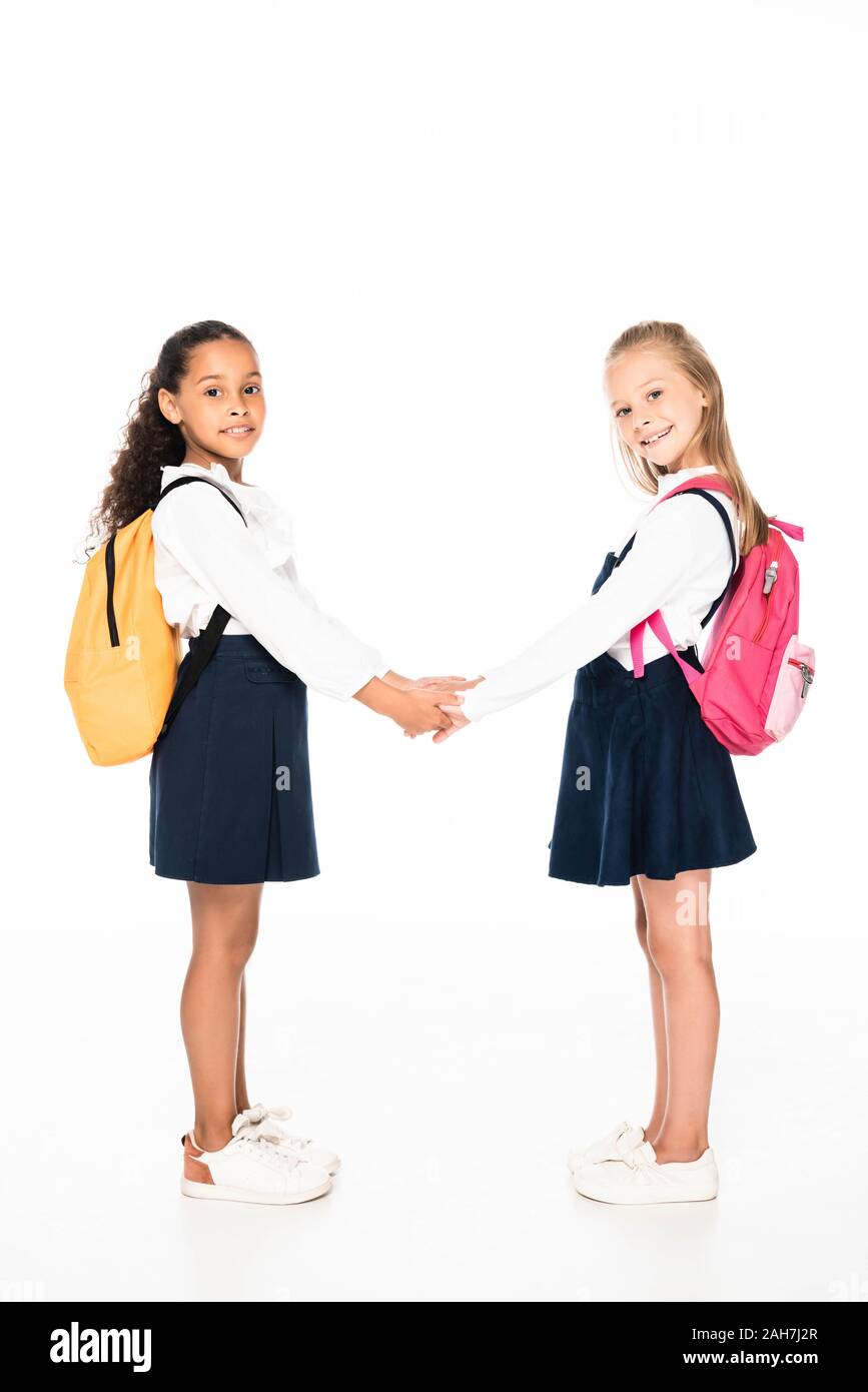 Teens Holding Hands At School