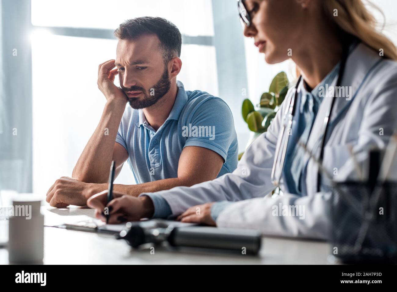Sad man writing hi-res stock photography and images - Alamy