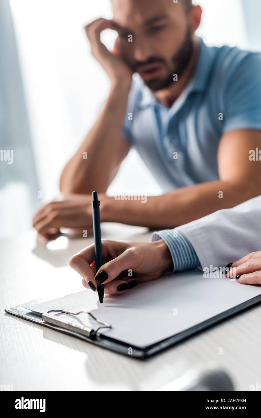 Sad man writing hi-res stock photography and images - Alamy