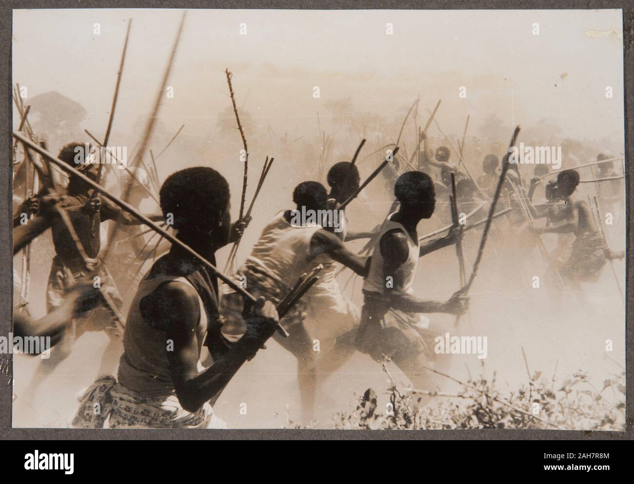 Somalia, A close-up shot of two groups of men fighting each other with ...