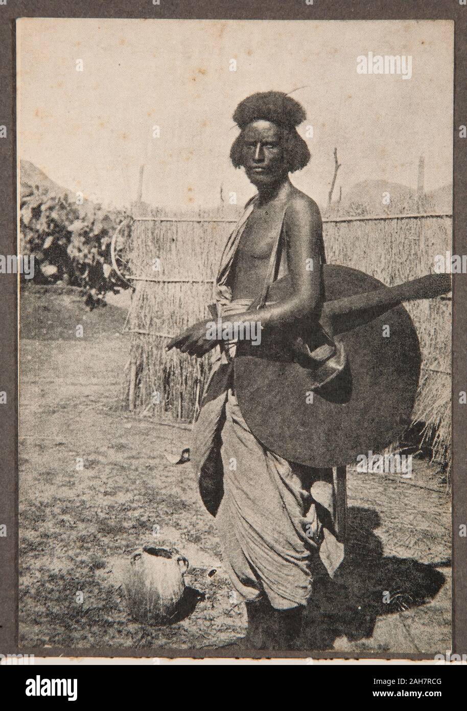 Somalia, Portrait, possibly a postcard, of a Somali man carrying a ...