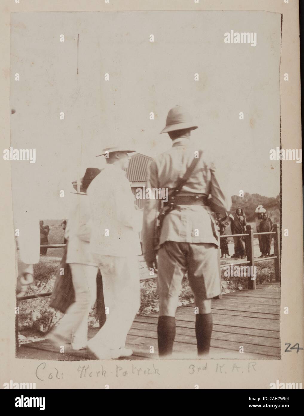 SomaliaJubaland, Three men photographed from behind, including Col ...
