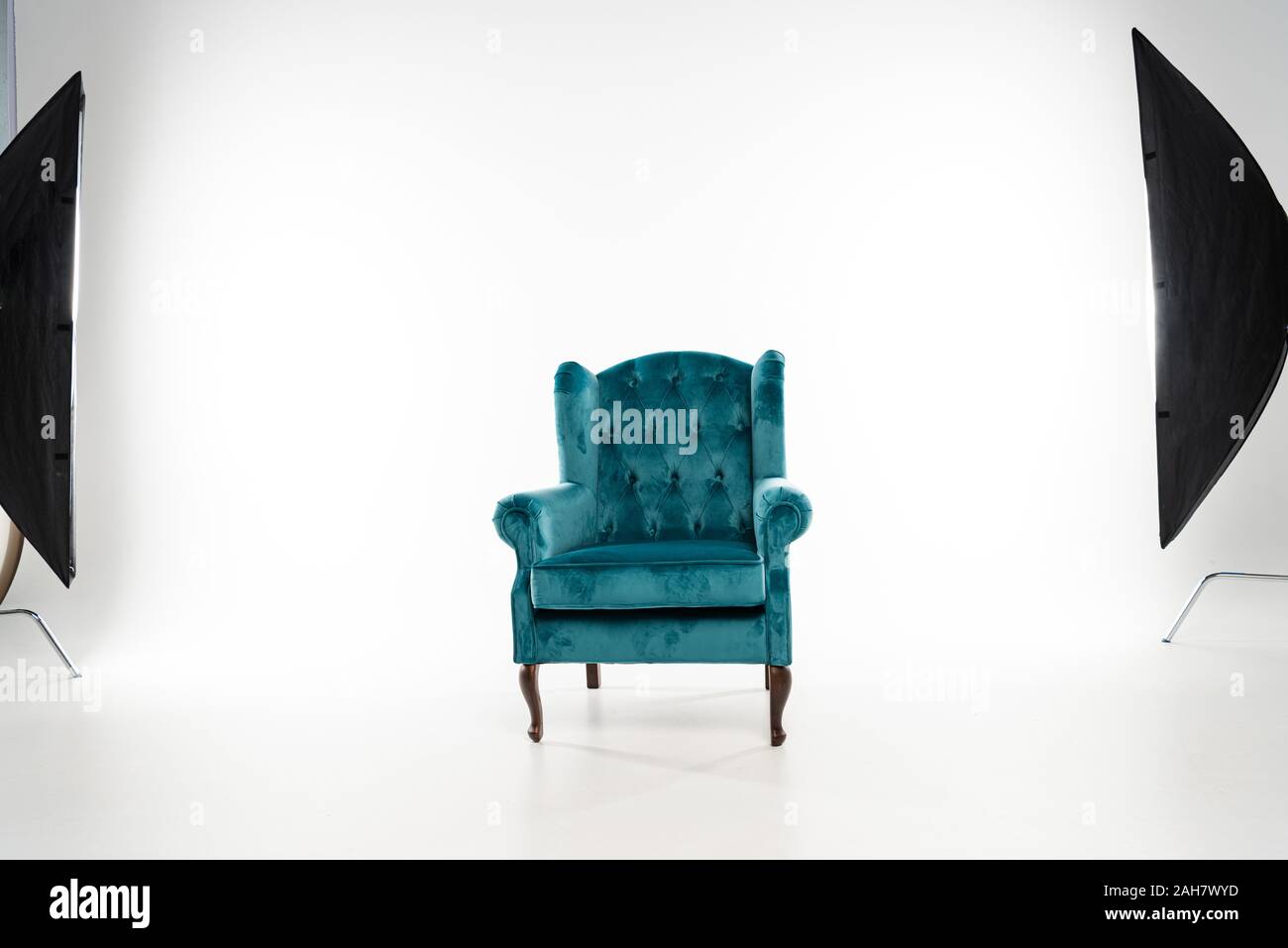Turquoise armchair with studio light on white background Stock Photo ...