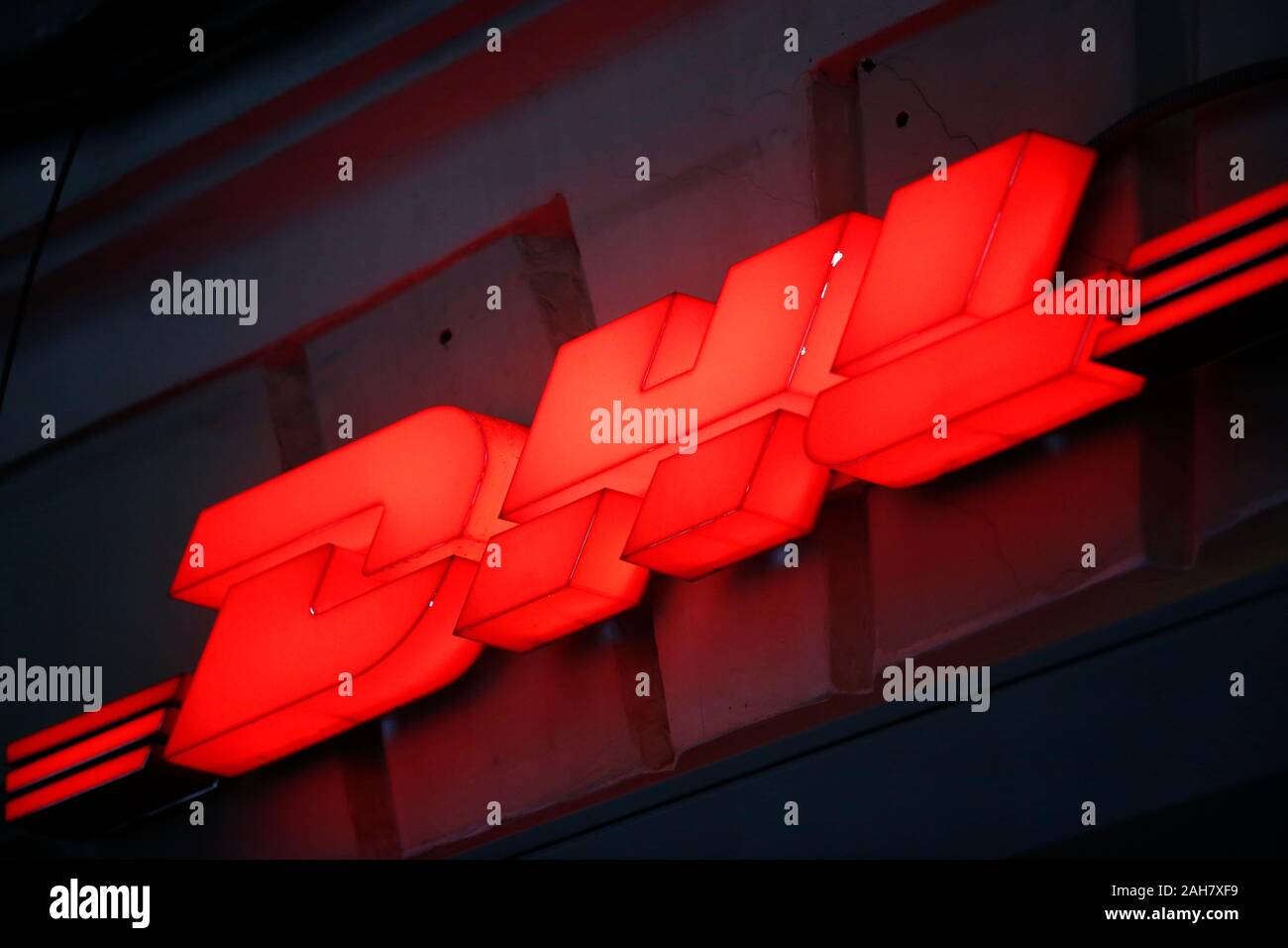 An international courier, parcel, and express mail service DHL (Dalsey ...