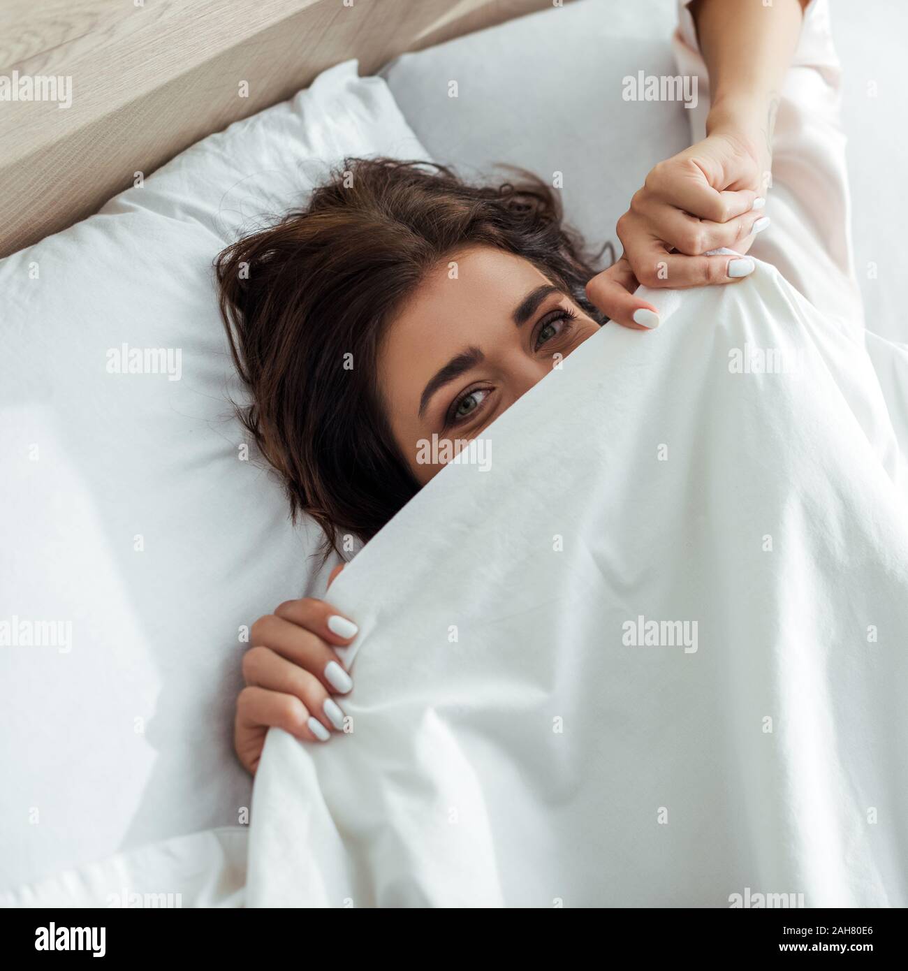 Obscuring her face hi-res stock photography and images - Alamy