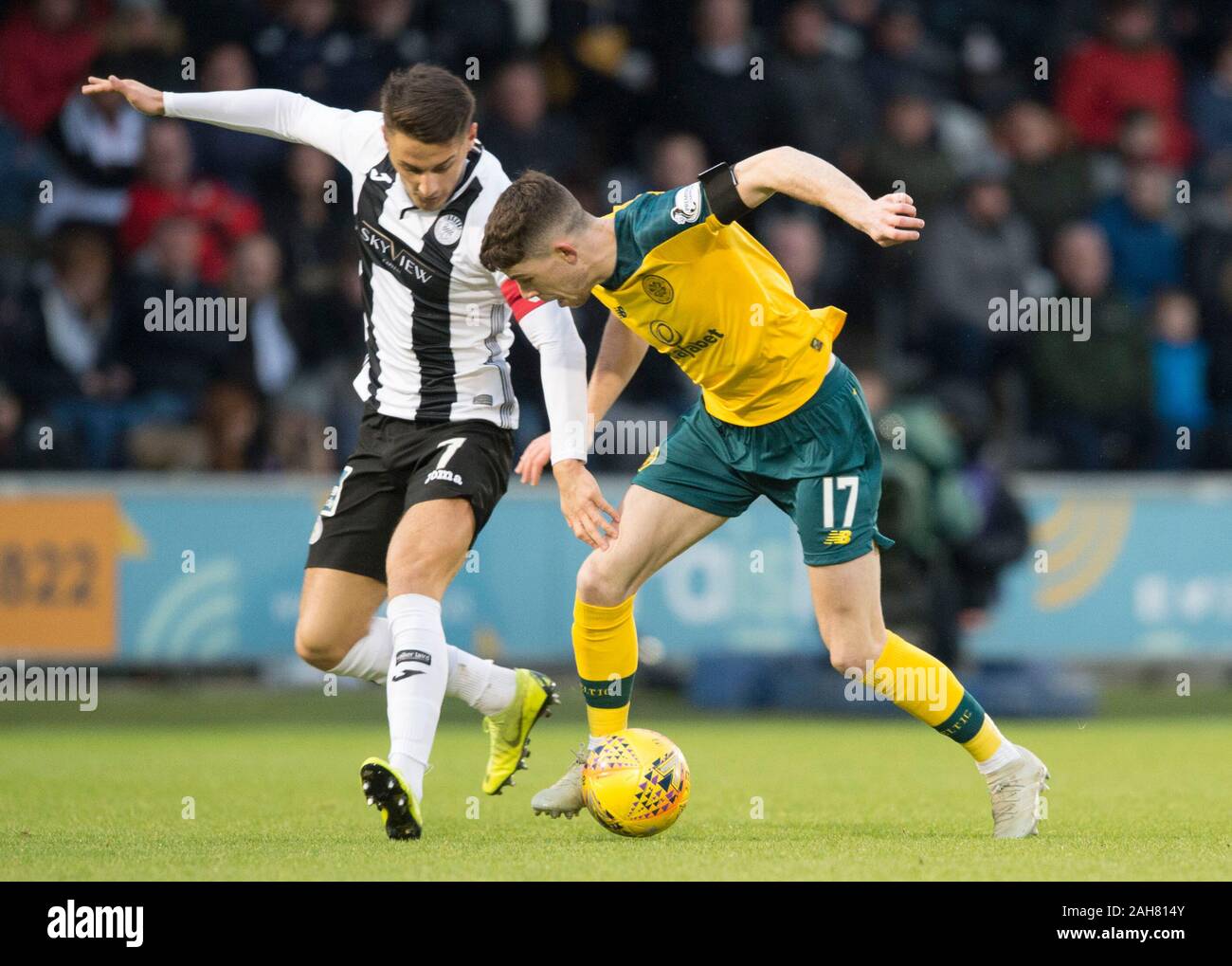 St Mirren's (left) Kyle Magennis and Celtic's Ryan Christie battle for ...