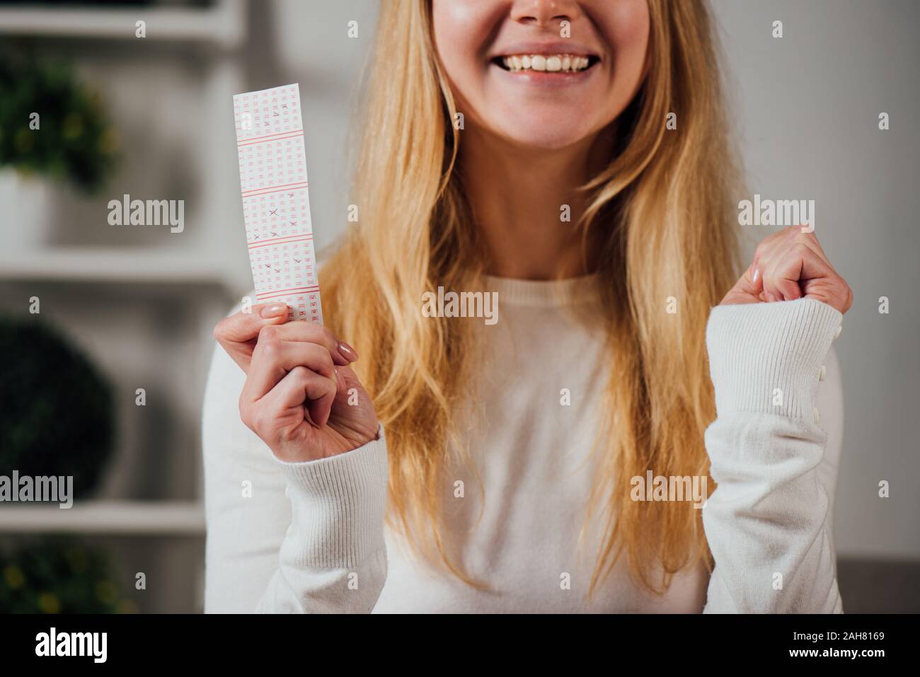 Lottery ticket winner excited hi-res stock photography and images - Alamy