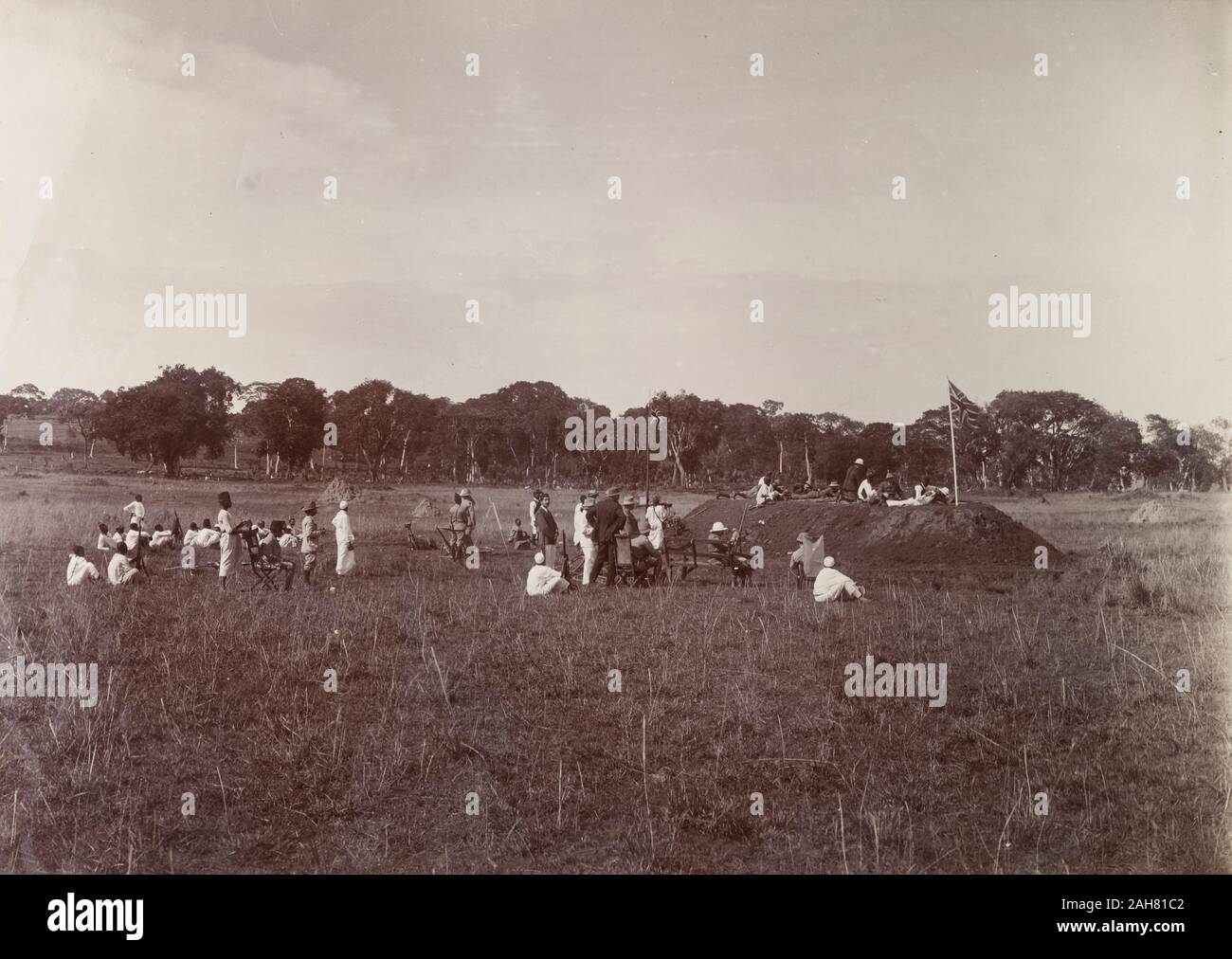 Uganda, A group of European men, accompanied by their African servants ...
