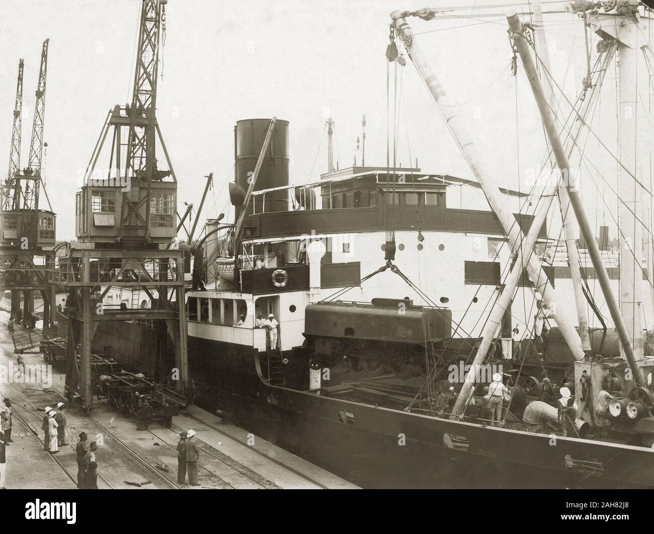 Kenya, A locomotive tender being lifted by onboard crane from the SS ...