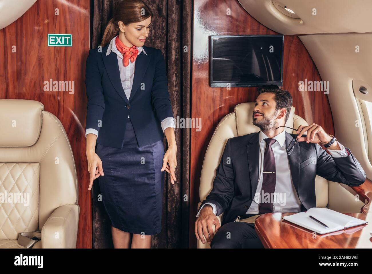 Man plane flight attendant hi-res stock photography and images - Alamy