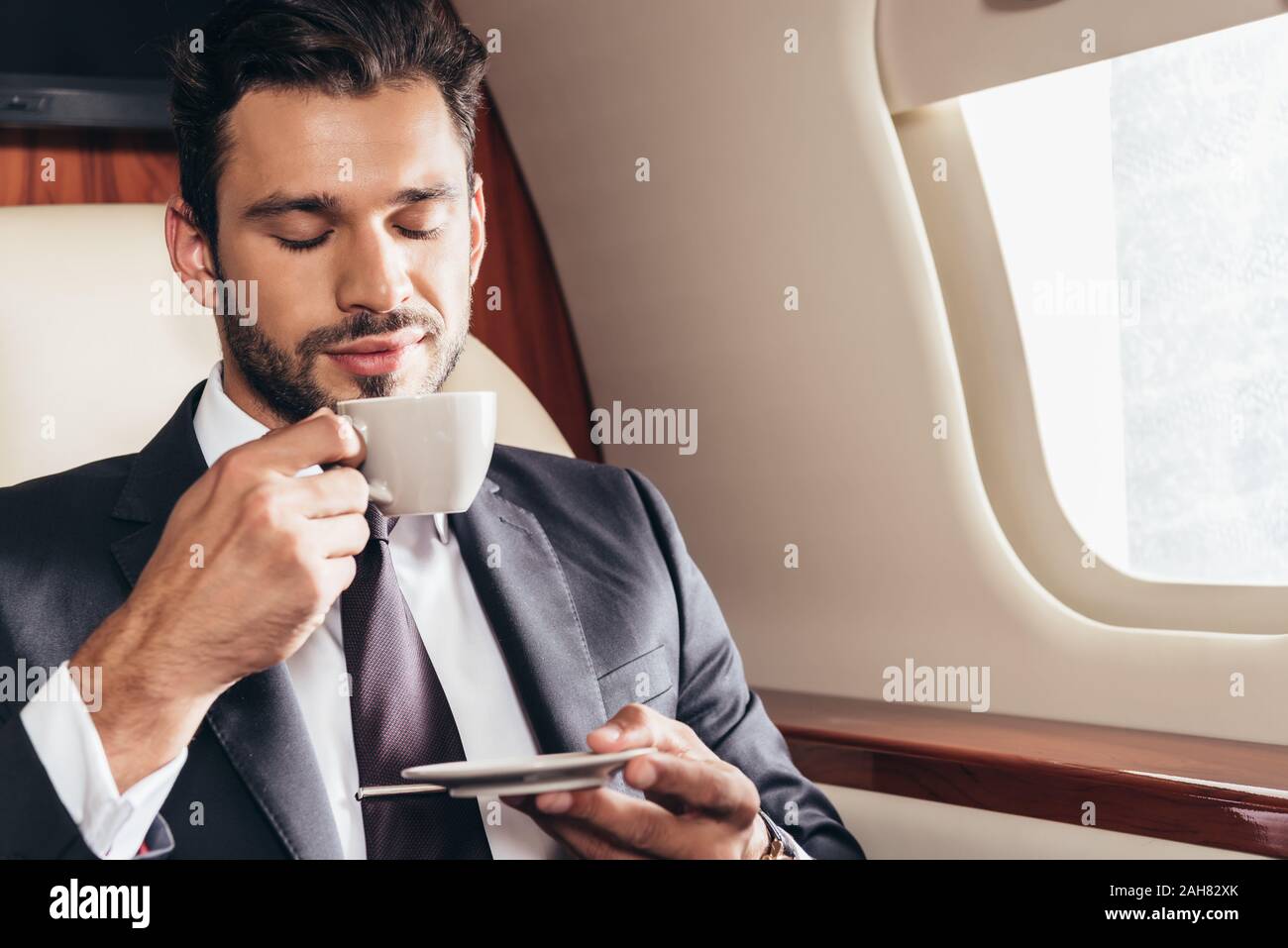 Young caucasian man smelling cup hi-res stock photography and images ...