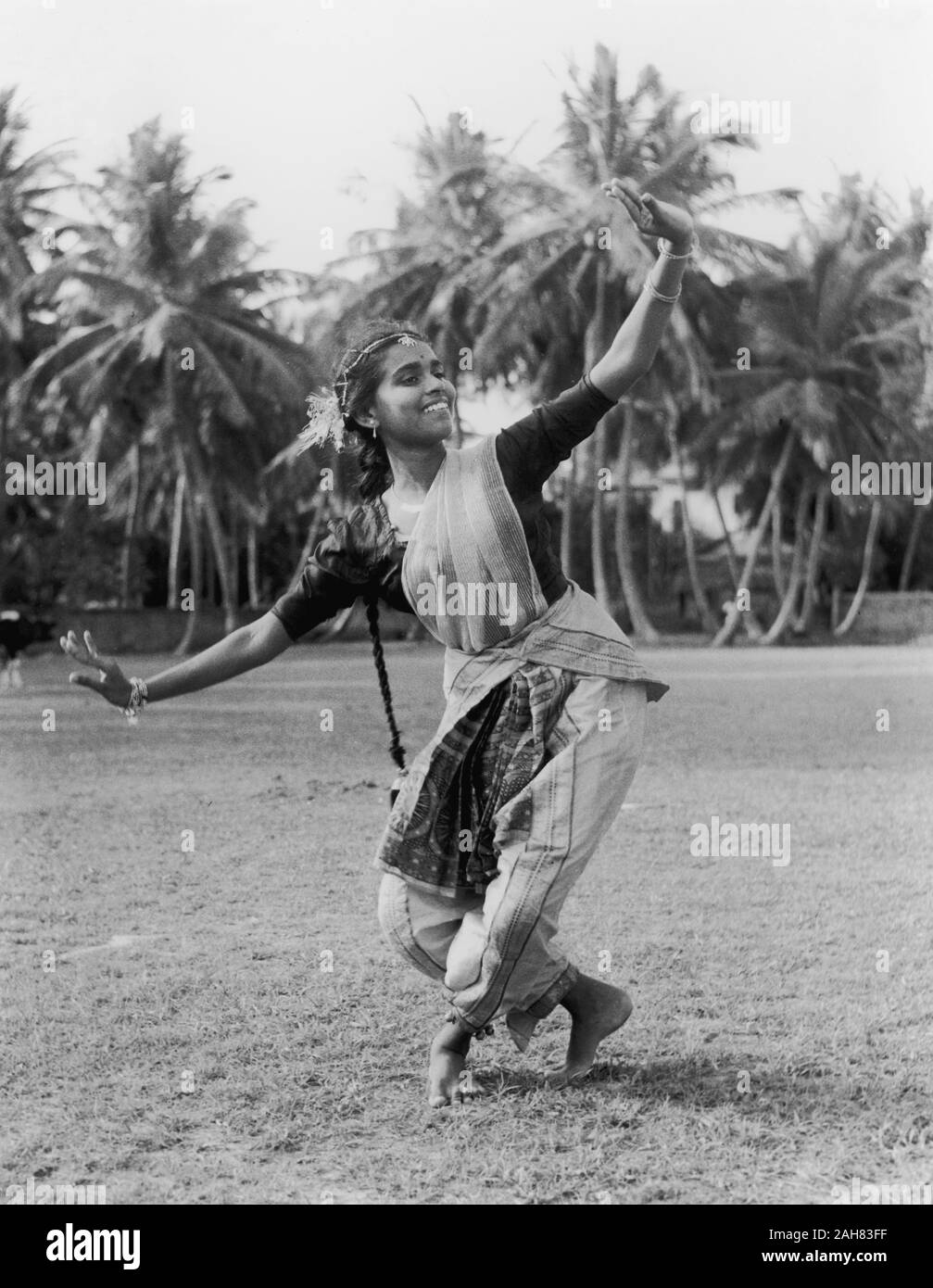 Sri LankaCeylon, Sri Lankan tamil dancer. A young Tamil woman smiles as ...