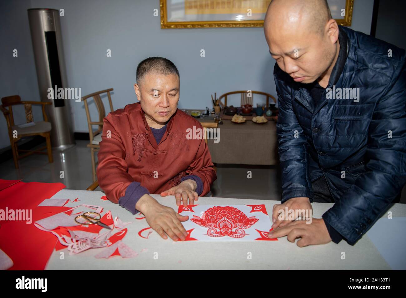 Jincheng, China's Shanxi Province. 26th Dec, 2019. Zhang Yongzhong (L ...