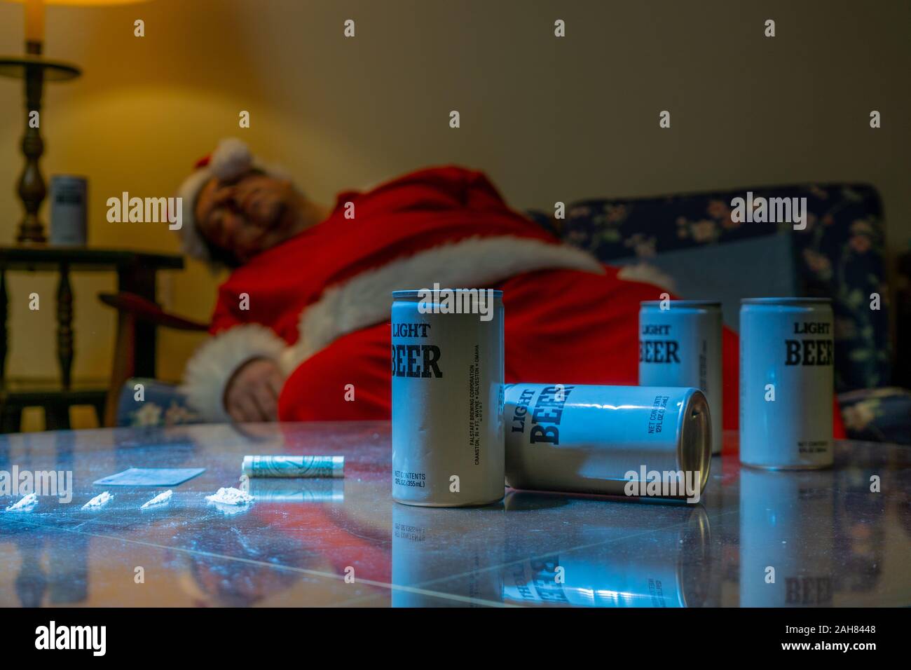 Bad Santa passed out after a niht of post-Christmas partying Stock ...