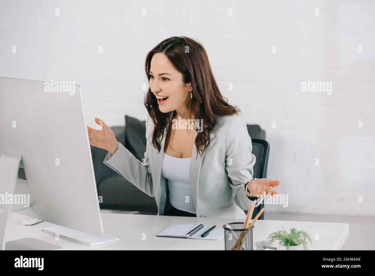 Surprised shocked secretary desk hi-res stock photography and images ...