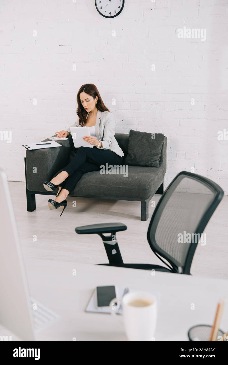 Elegant secretary sitting on chair hi-res stock photography and images ...