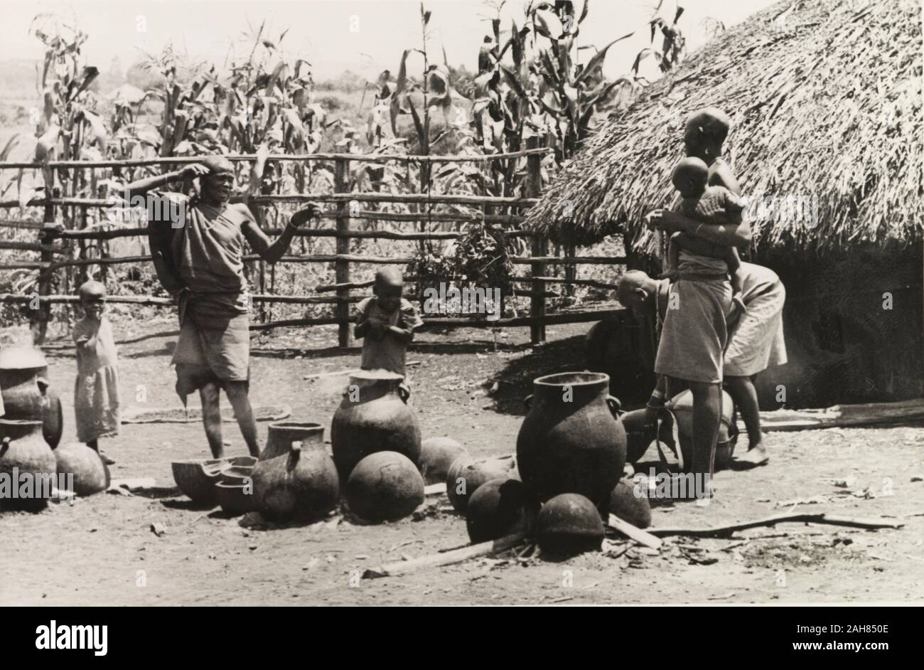 Kenya, Three Kikuyu women look after several small children as they ...