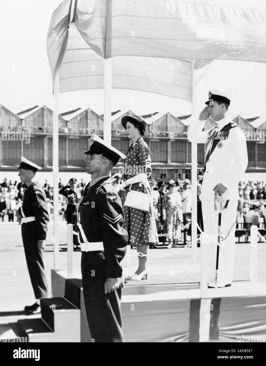 Kenya, Princess Elizabeth and The Duke of Edinburgh stand on a covered ...