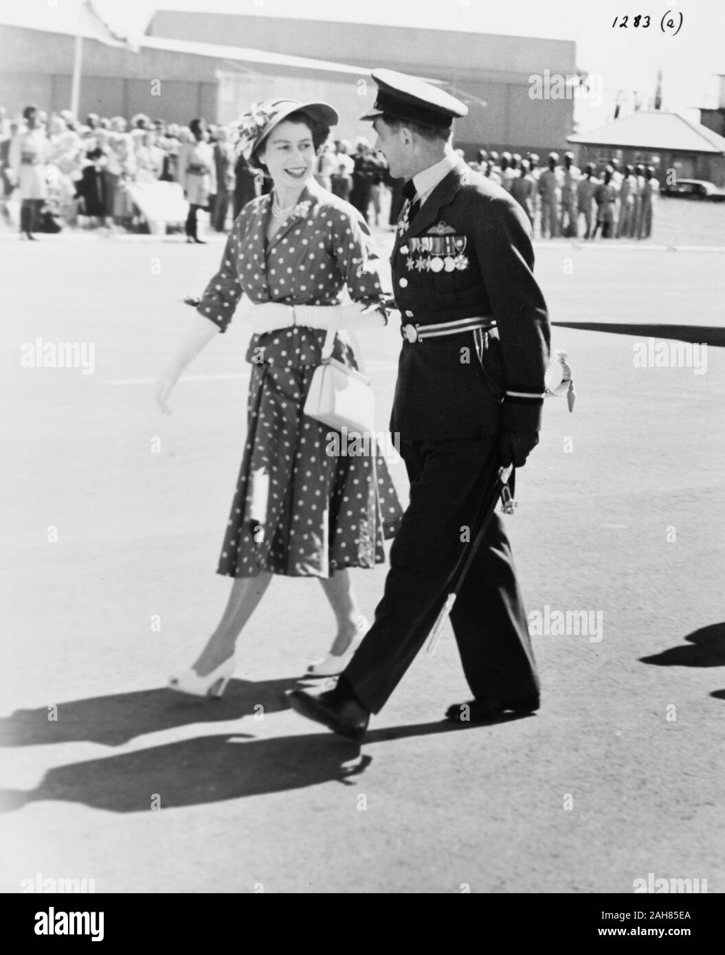 Kenya, Princess Elizabeth chats to an unidentified uniformed man ...