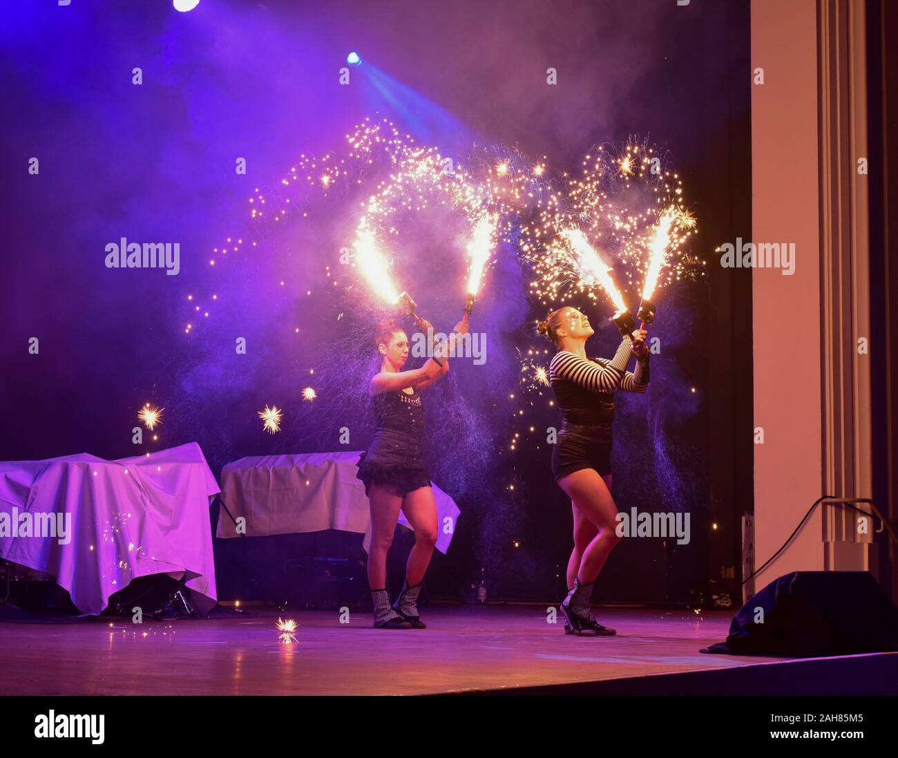 Ballet girls entertaining public with fire show Stock Photo - Alamy