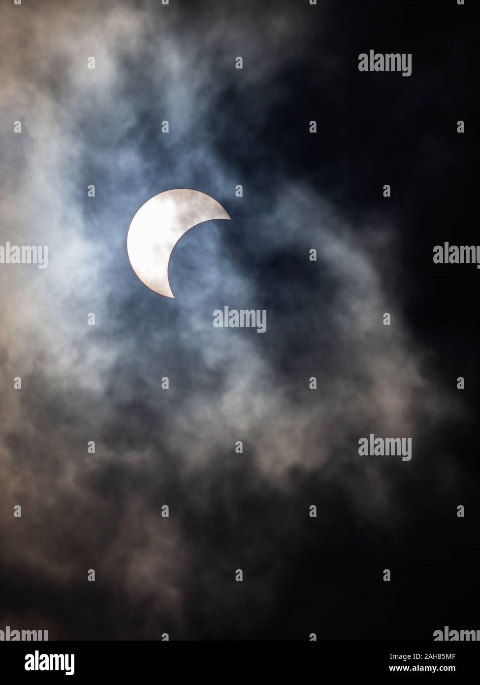 Sun eclipse phenomenon with dark cloud scape on sky Stock Photo - Alamy