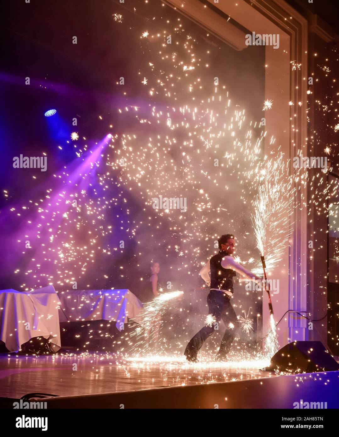 Fire magician entertaining public Stock Photo - Alamy