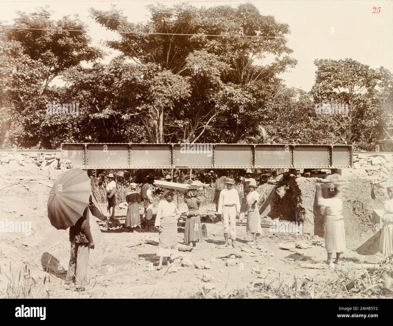 Trinidad & Tobago, Female labourers clear rubble from beneath a railway ...