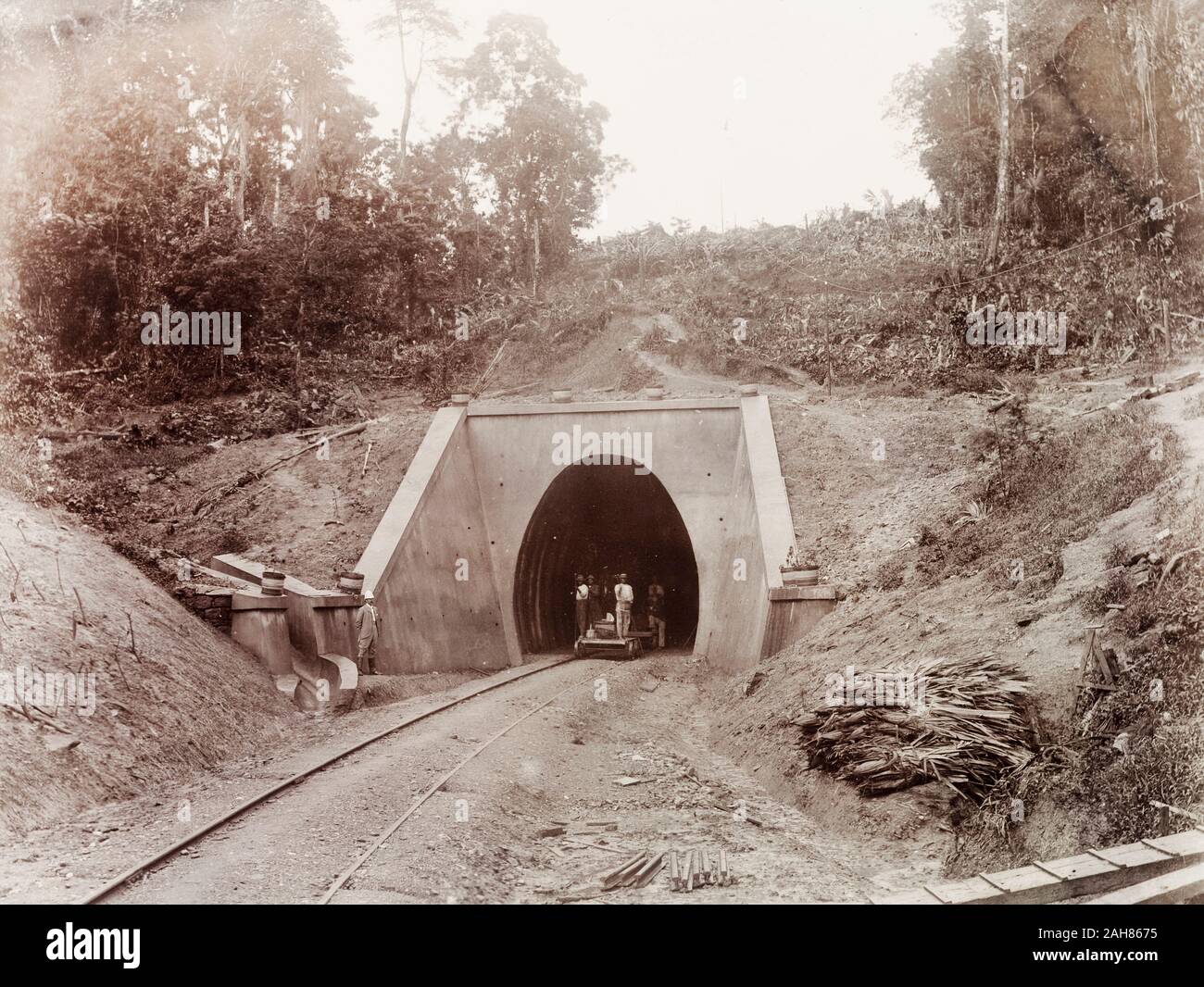 Trinidad & Tobago, Trinidad Government Railway workers stand on a rail ...