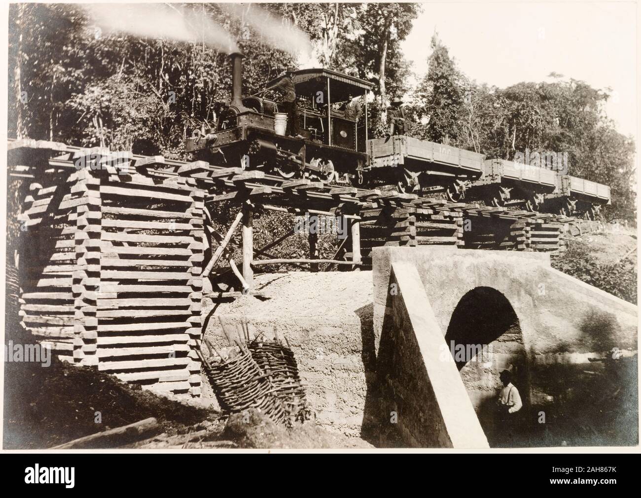 Trinidad & Tobago, A small steam train crosses culvert 'No. 35' on a ...