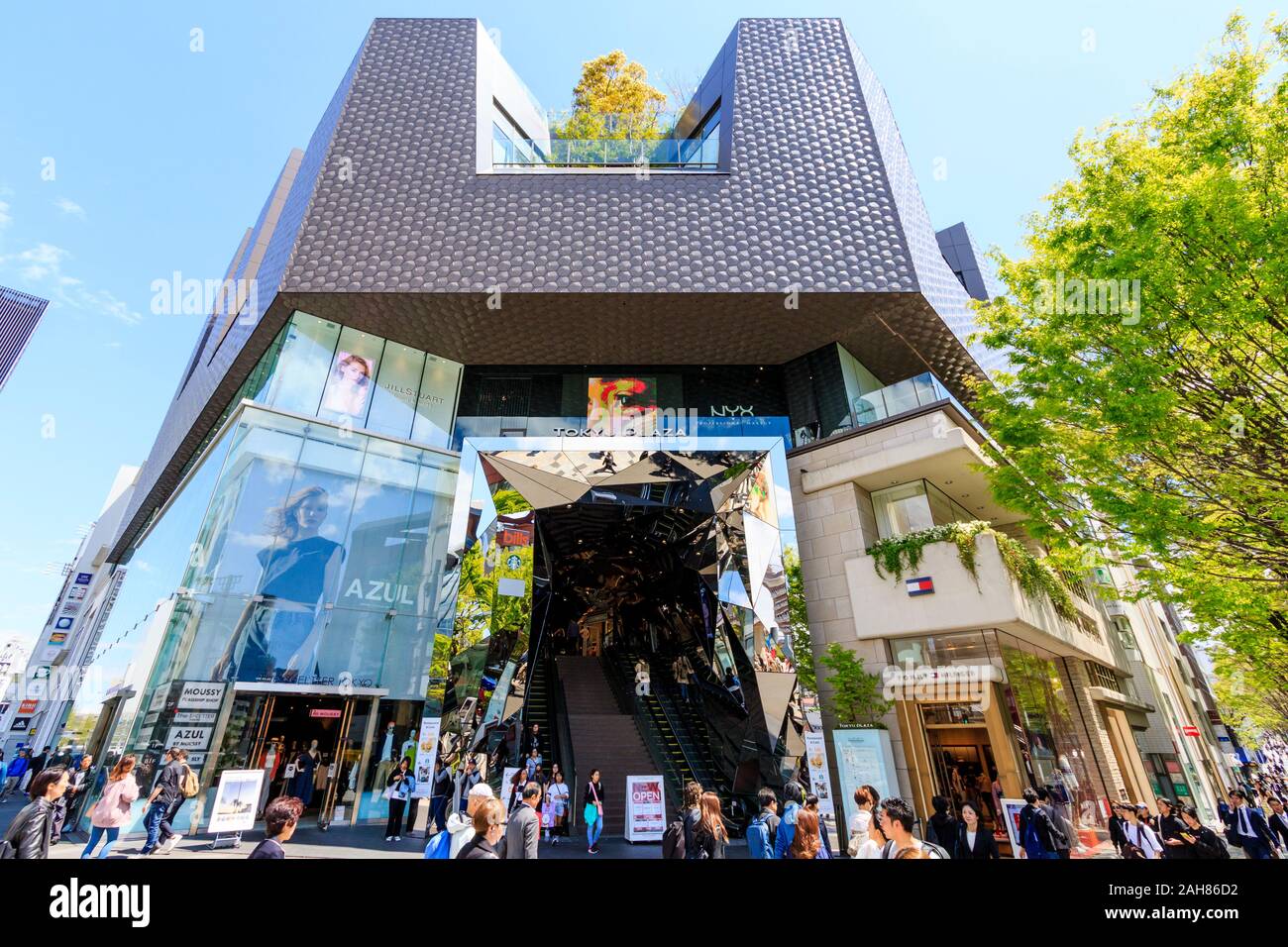 The facade of the Tokyu Plaza building in Omotesando, Tokyo. Springtime ...