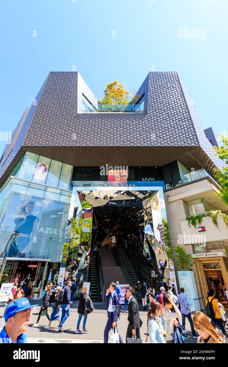 The facade of the Tokyu Plaza building in Omotesando, Tokyo. Springtime ...