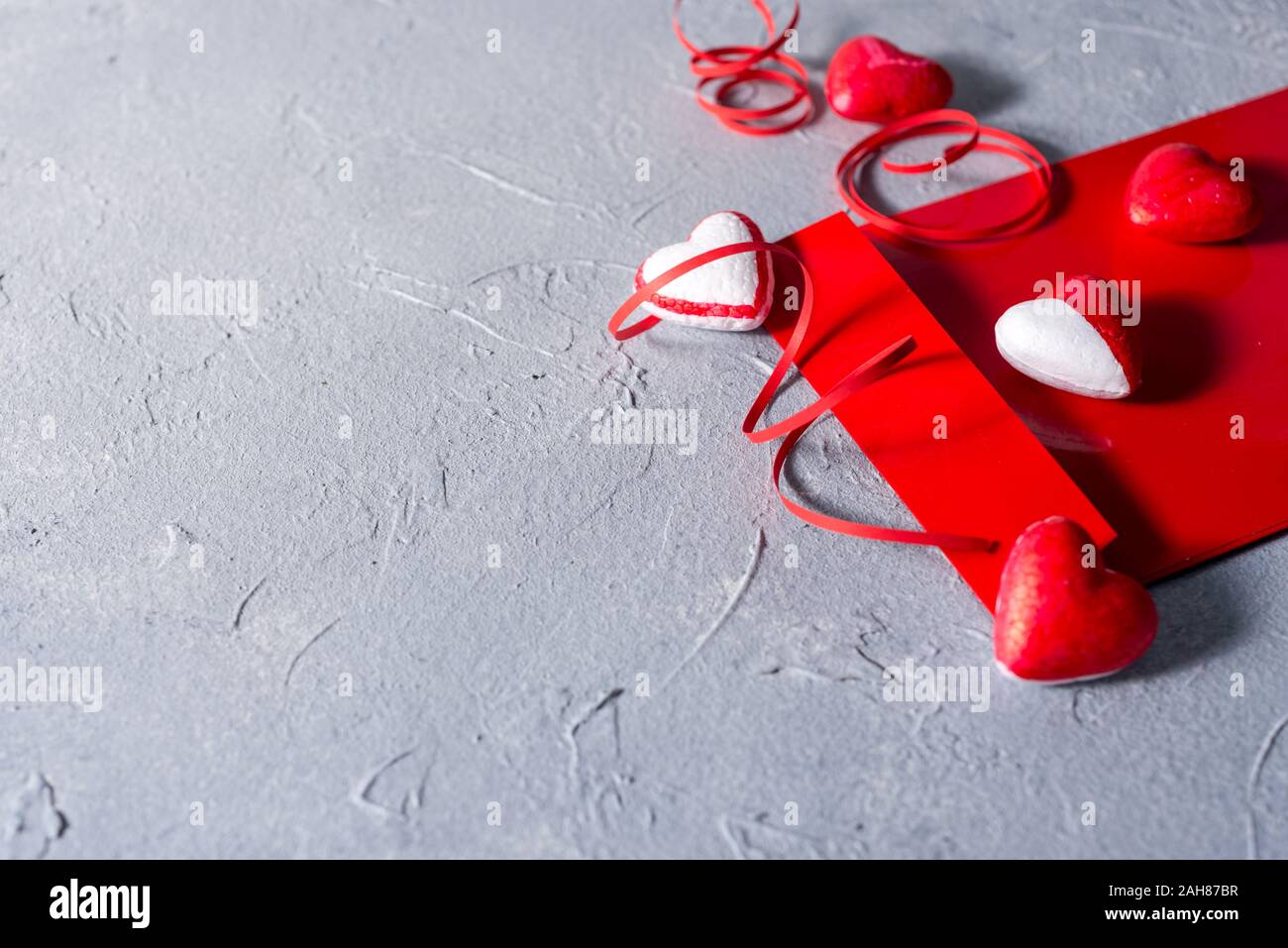 Valentine's day romantic abstract satin hearts and ribbon background ...