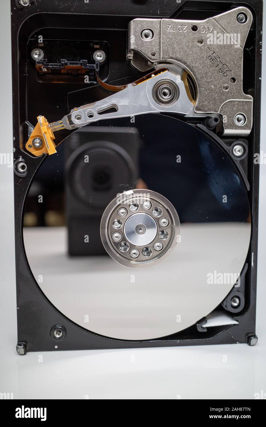 a screwed-on hard disk shows the inner workings of a hard disk Stock ...