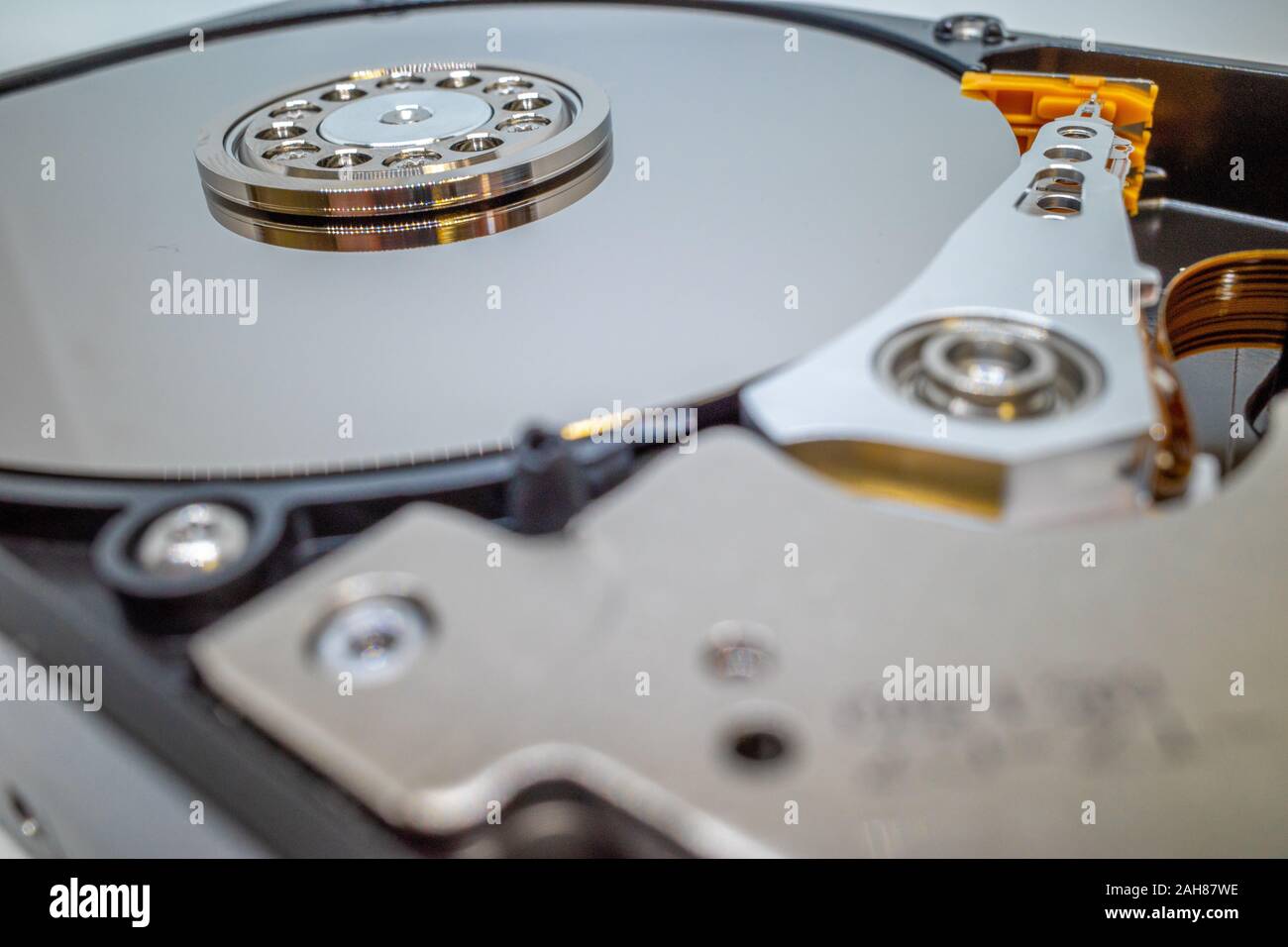 a screwed-on hard disk shows the inner workings of a hard disk Stock ...