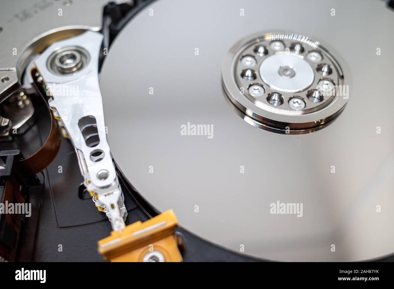 a screwed-on hard disk shows the inner workings of a hard disk Stock ...